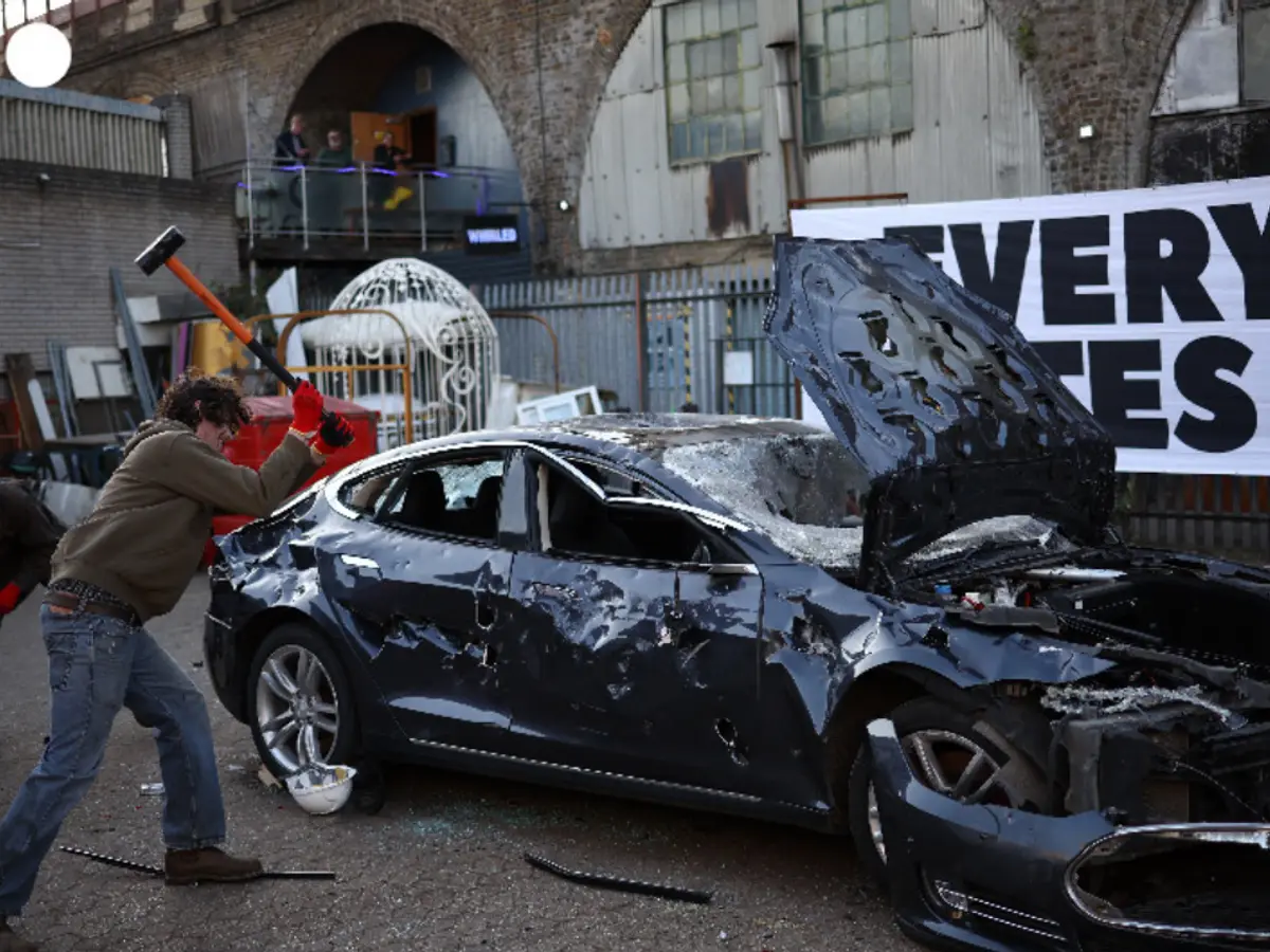'Everyone Hates Elon' group smashes Tesla car in London protest; pics here